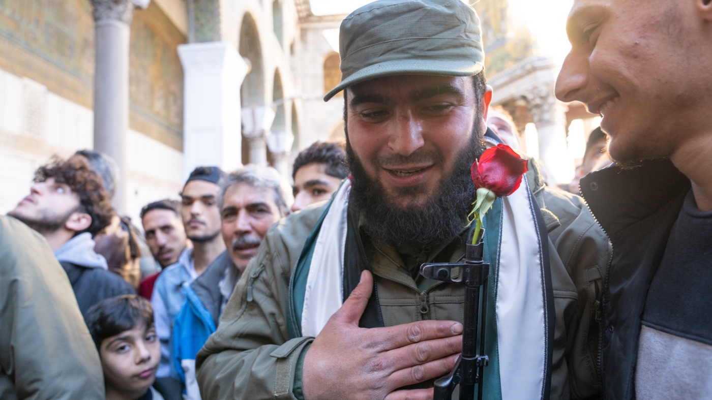 Syrians gather for Friday prayers in Damascus after Assad falls : NPR