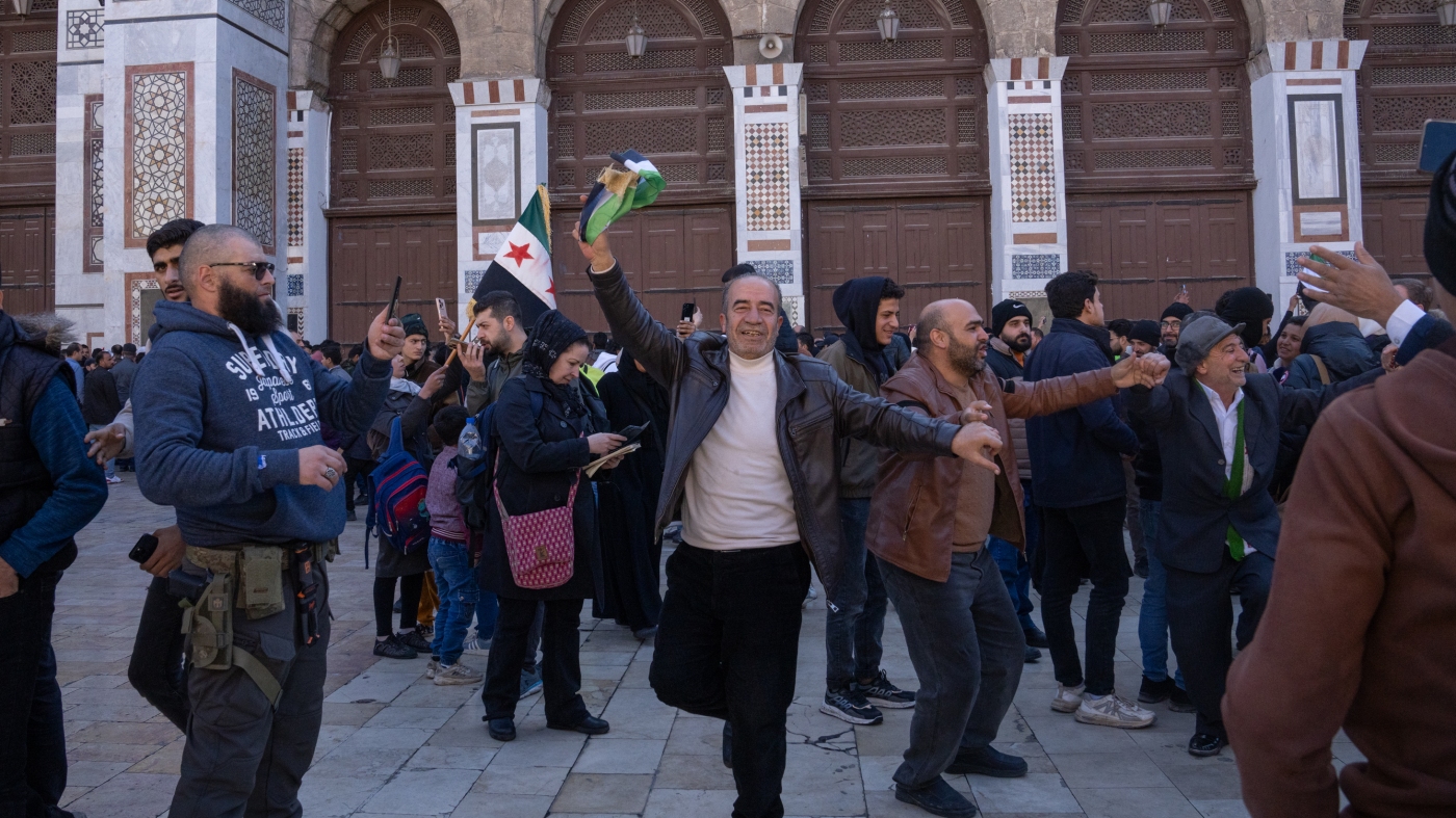 Syrians gather for Friday prayers in Damascus after Assad falls : NPR