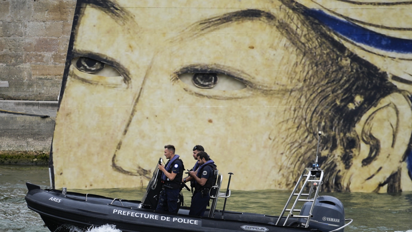 Photos from Paris Olympics opening ceremony : The Picture Show : NPR