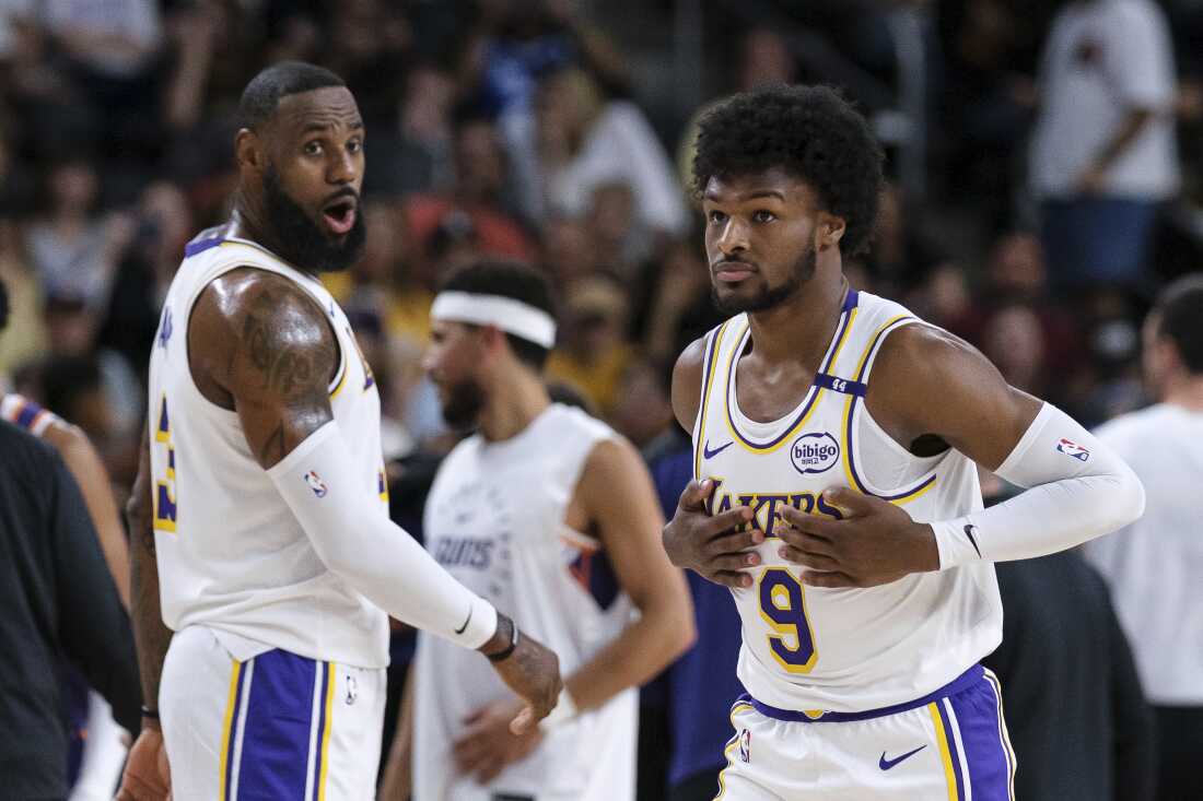 LeBron and Bronny James play together for first time in preseason game for the Lakers : NPR