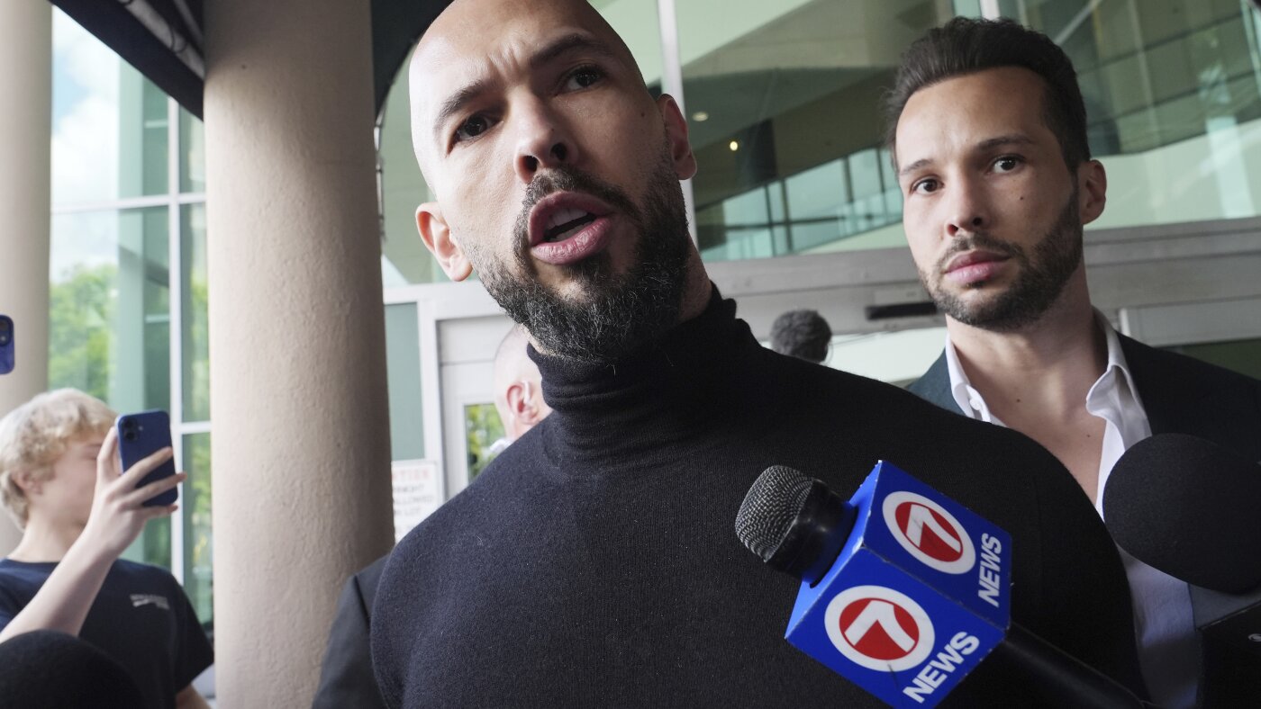 Andrew Tate, brother arrive in Florida from Romania : NPR