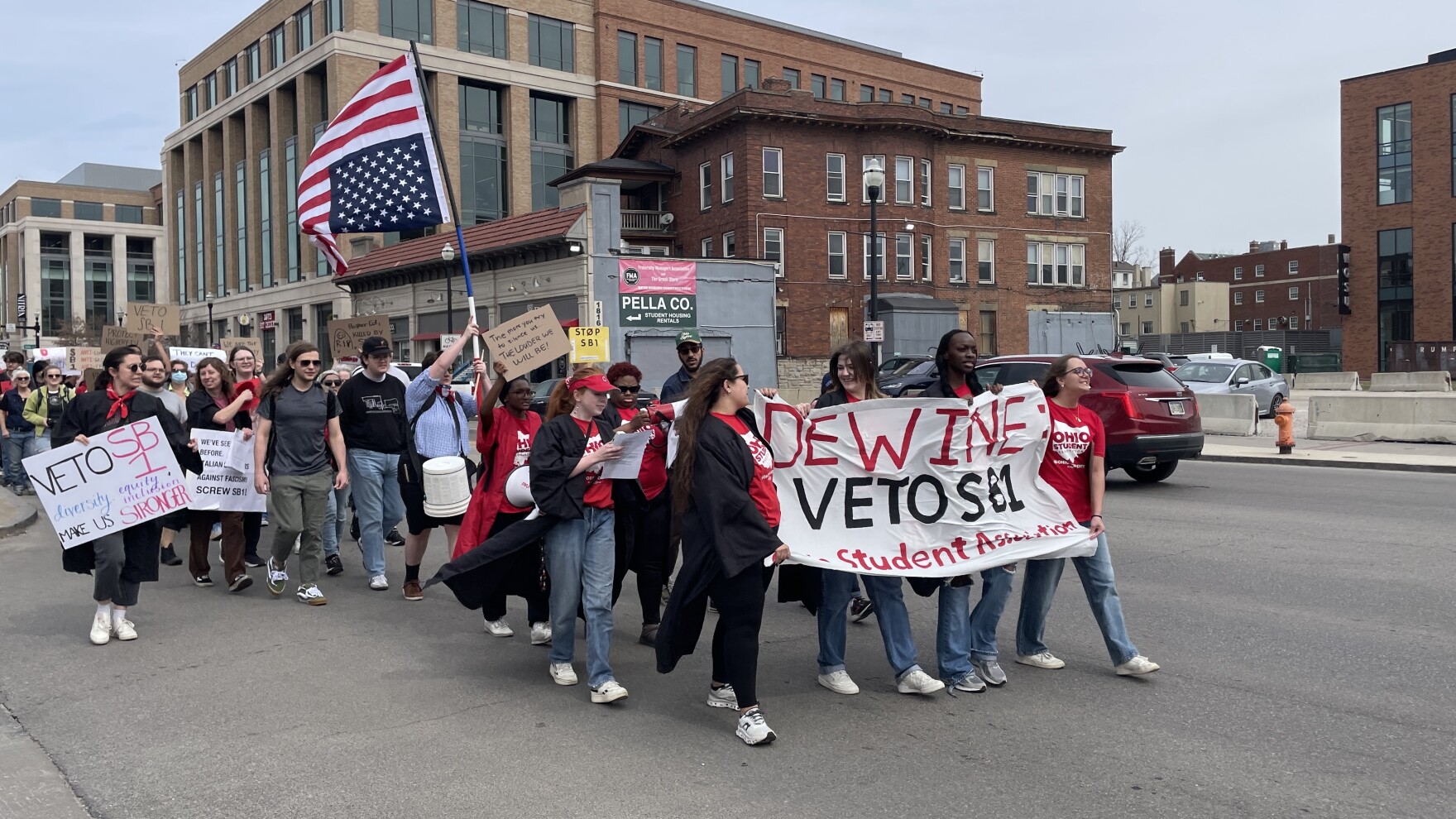 Ohio State students march to Statehouse to protest bill that would ban ...