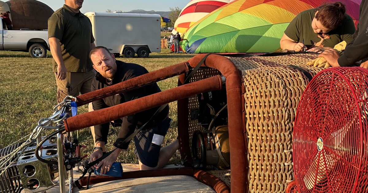 About a hundred hot air balloons ready to take flight