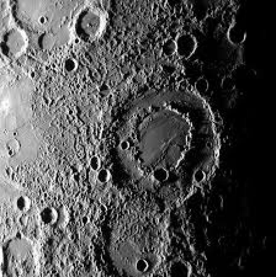 pluto moons and rings