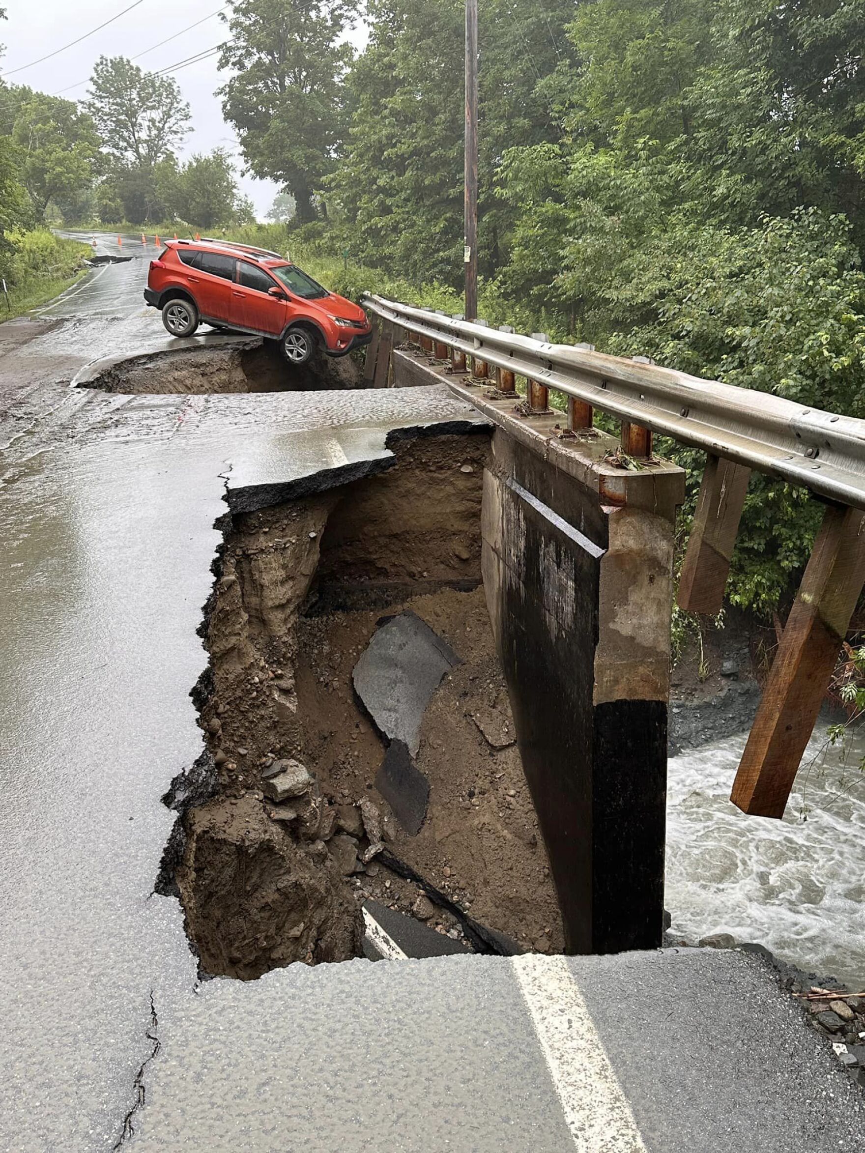 Latest round of flooding prompts road closures and rescues across ...