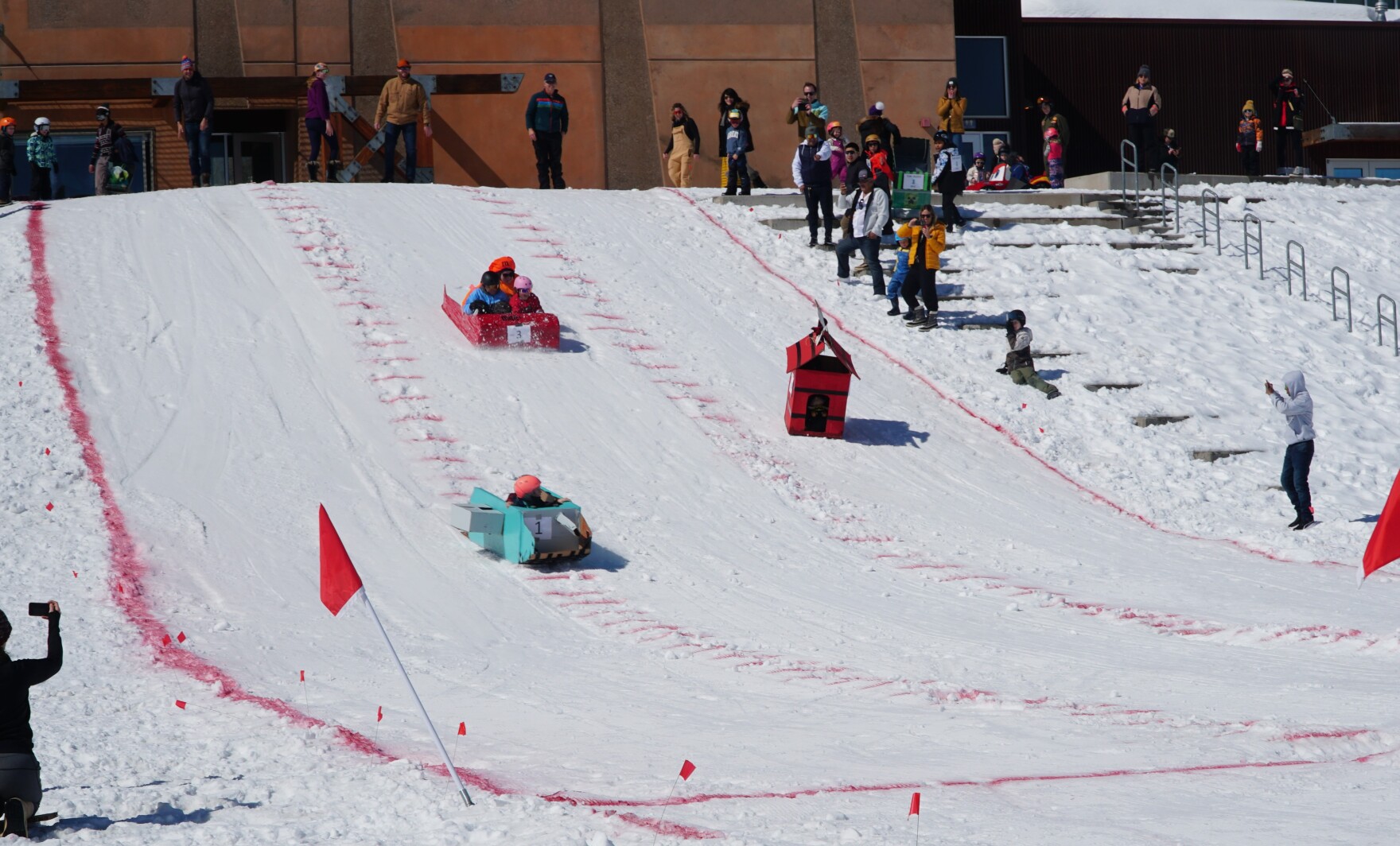 Hermione, Snoopy and a dragon race in Park City’s cardboard sled derby