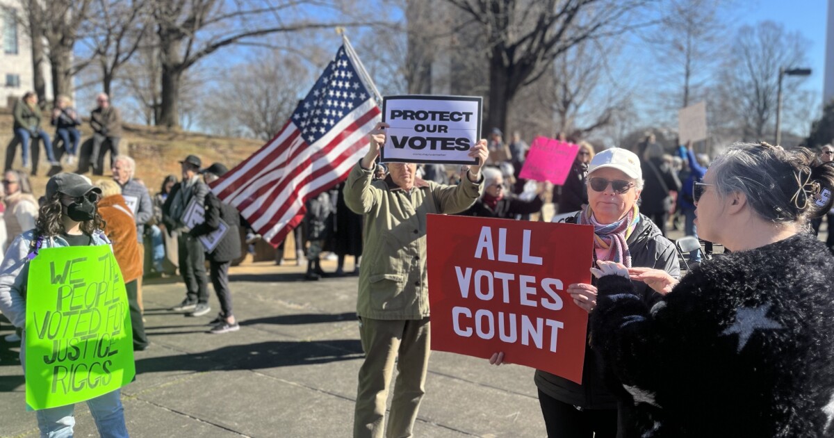 'Protect our votes' rally draws hundreds of Riggs supporters in ...