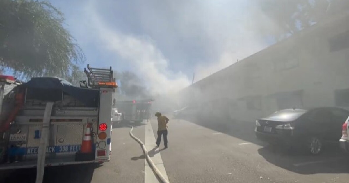 Firefighters stop apartment complex fire which gutted two units in ...