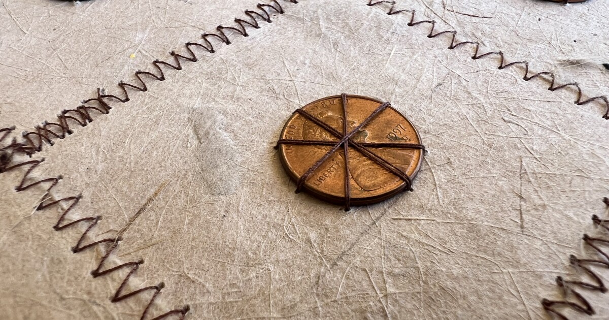 This Arizona artist covered a giant guitar in pennies and sewed them ...