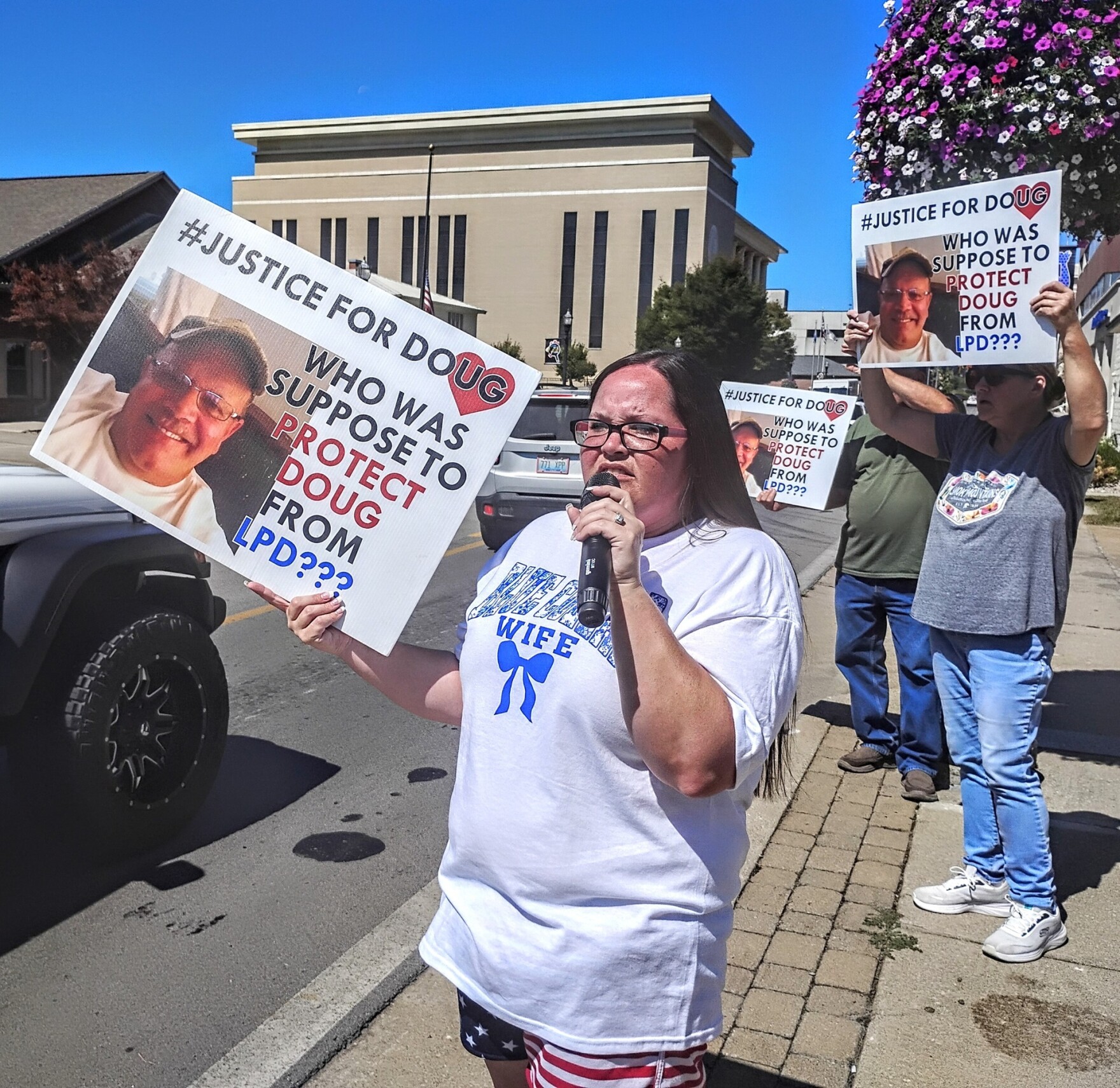 Despite change at the top, protesters still seek answers in Doug ...