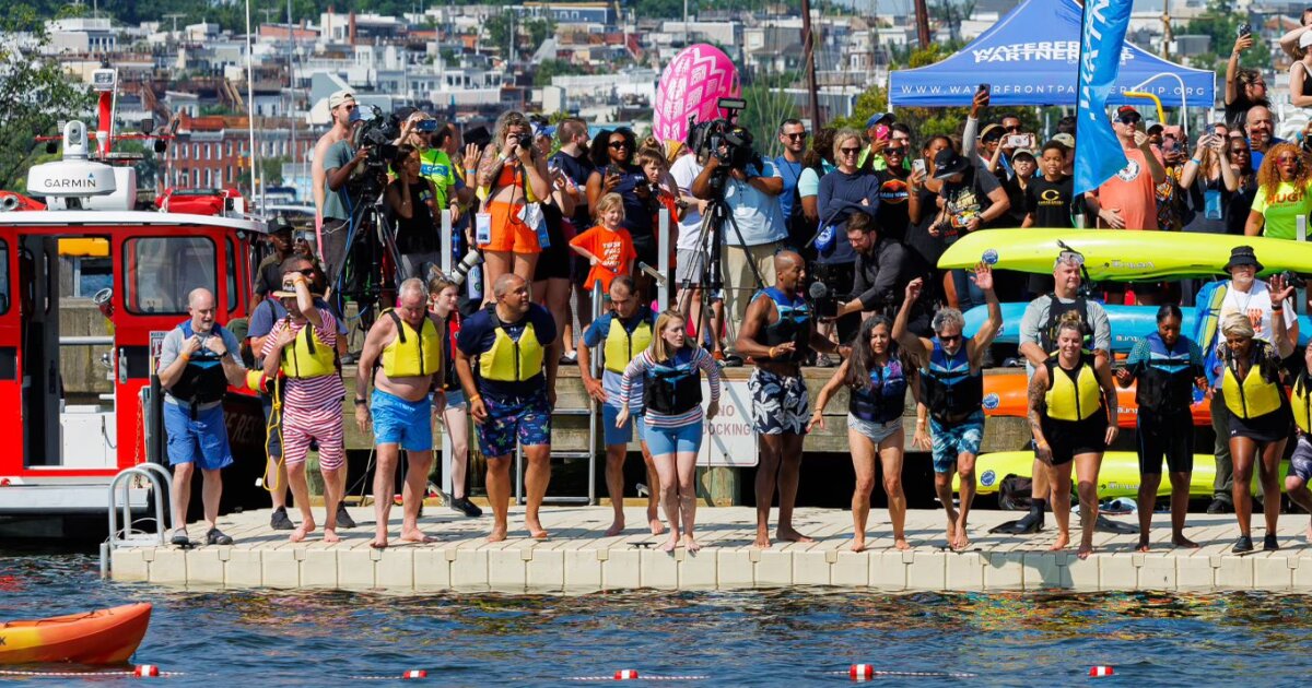 Baltimore mayor and others take the Harbor Splash plunge